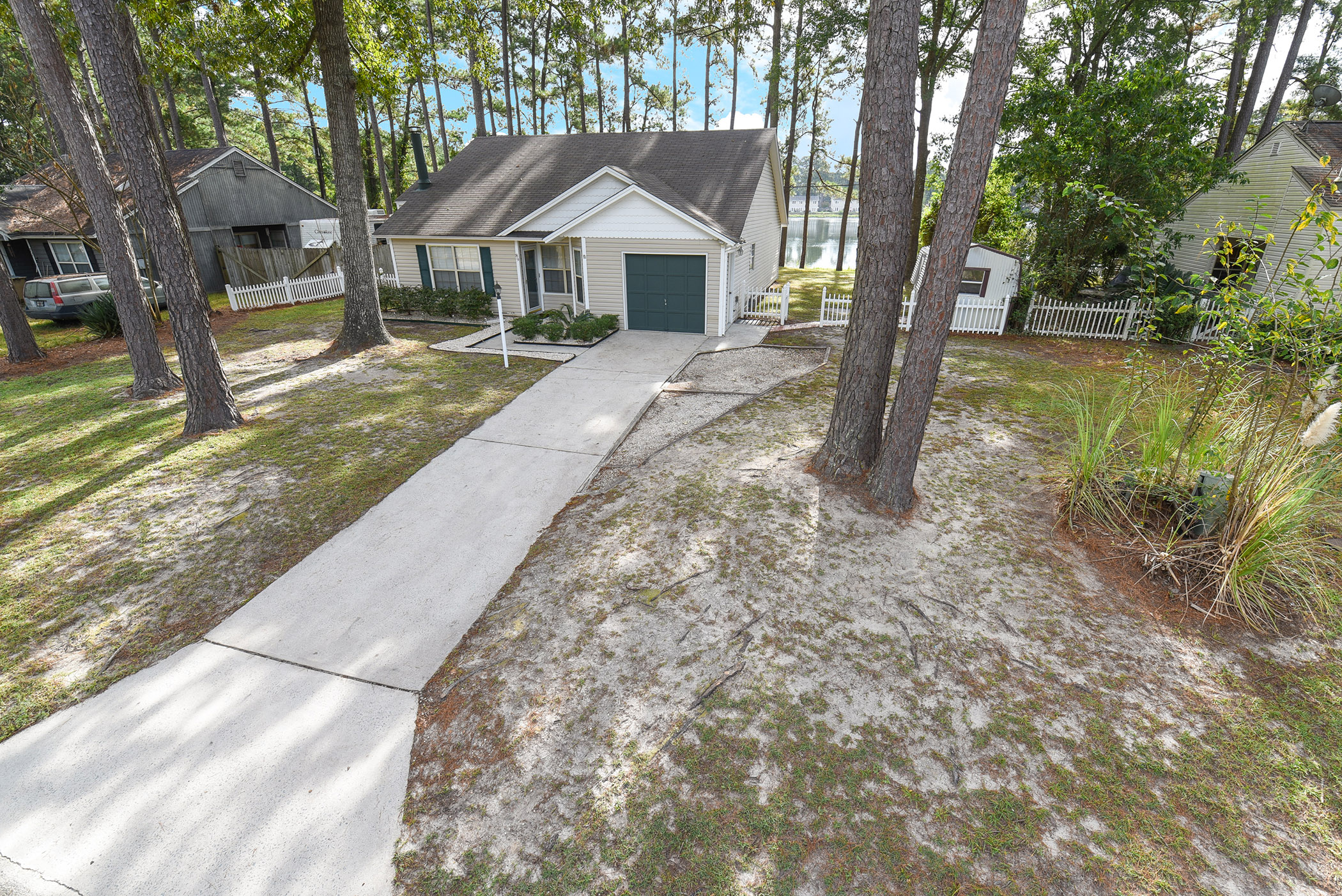 JUST LISTED ~ Spic and Span, 1-Owner, 1-Story Cottage on the Lake ...